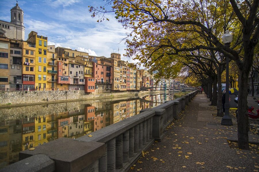 Reflection of Girona's colorful houses in the Onyar River