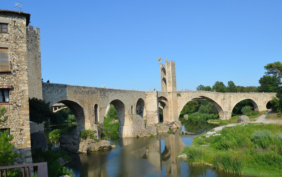 Old stone bridge over the Onyar River in Girona