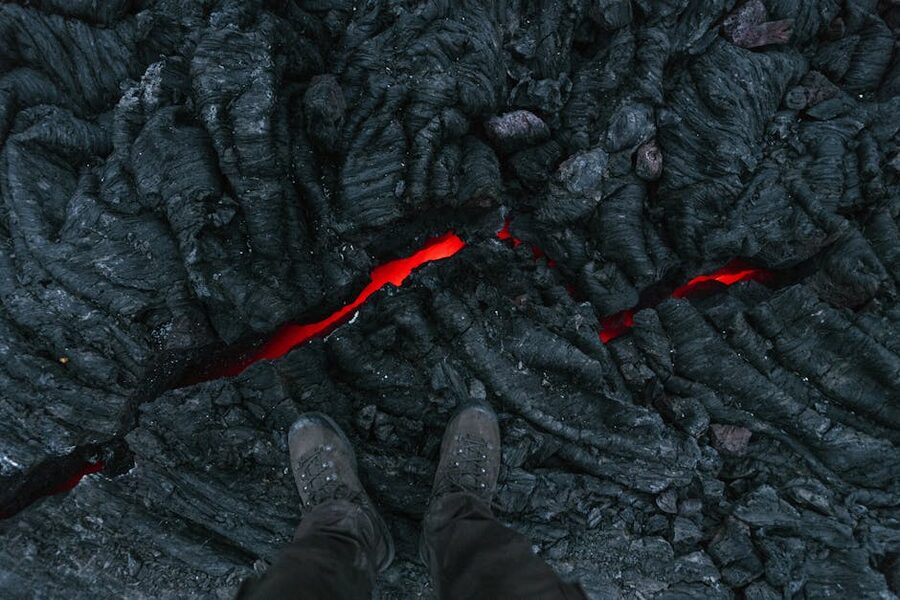 Hiking boots on volcanic rock