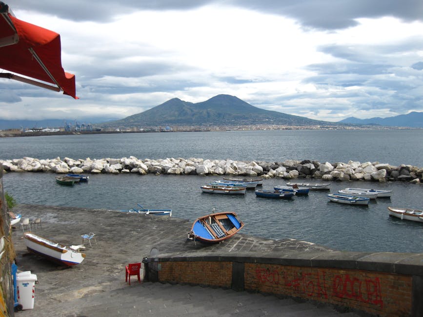 Naples pier with Mount Vesuvius in distance