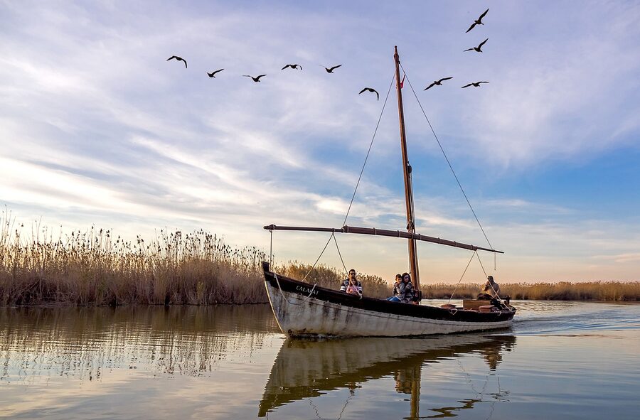 Sailboat reflection on Albufera lake