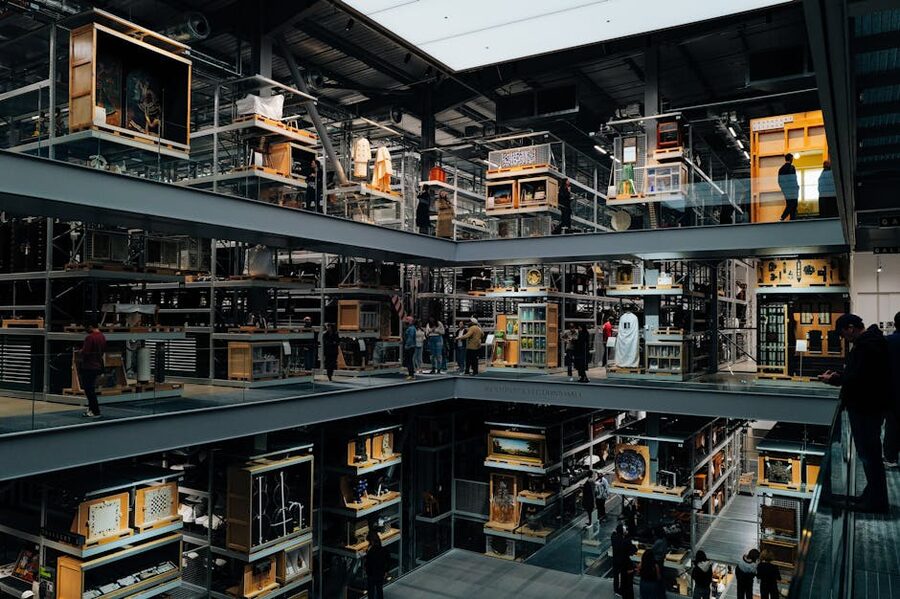 Multi-level modern art museum interior with visitors