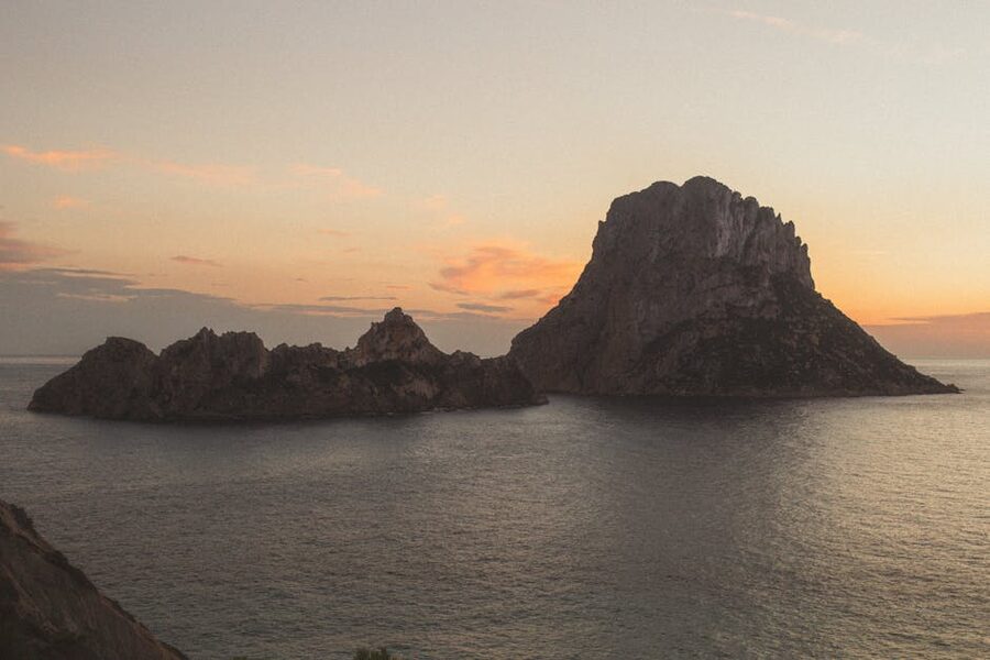 Es Vedra island Ibiza at sunset from sea