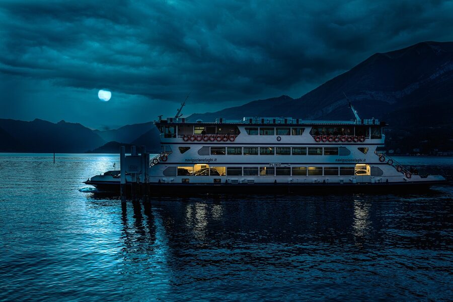 Lake Como ferry boat on calm water near Bellagio