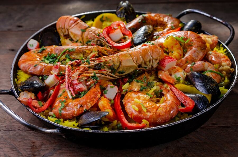 Close-up of seafood paella with prawns and mussels