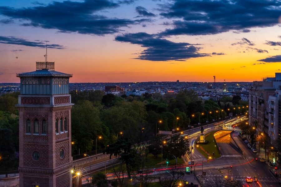 Madrid city skyline at sunset with monuments
