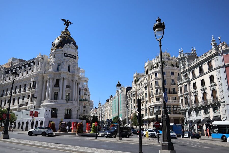 Metropolis Building on Gran Via Madrid against blue sky