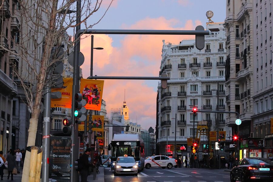 Gran Via Madrid with traffic and urban architecture