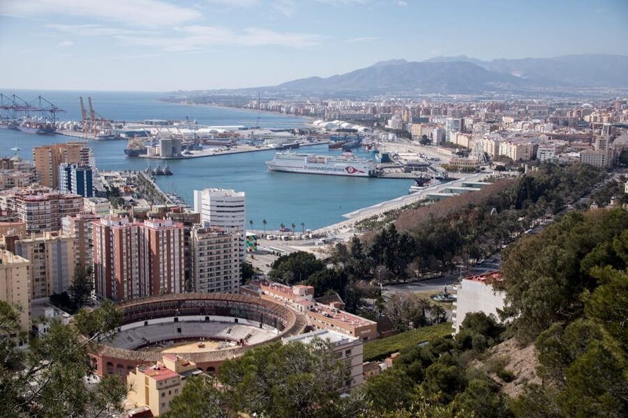 Aerial view of Málaga port and coastline at the start of a day trip