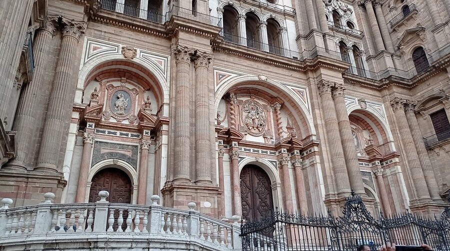 Main facade of Málaga Cathedral with one tower visible