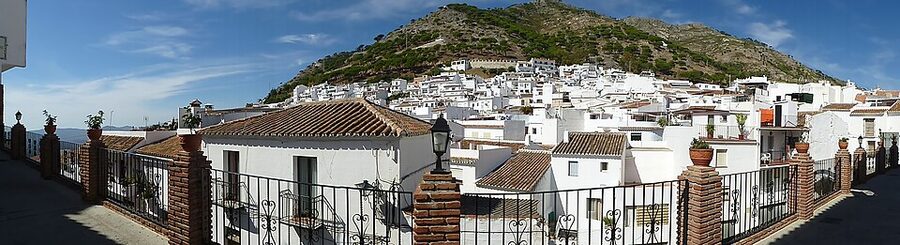Wide panorama of Mijas Pueblo set in the Andalusian hillside