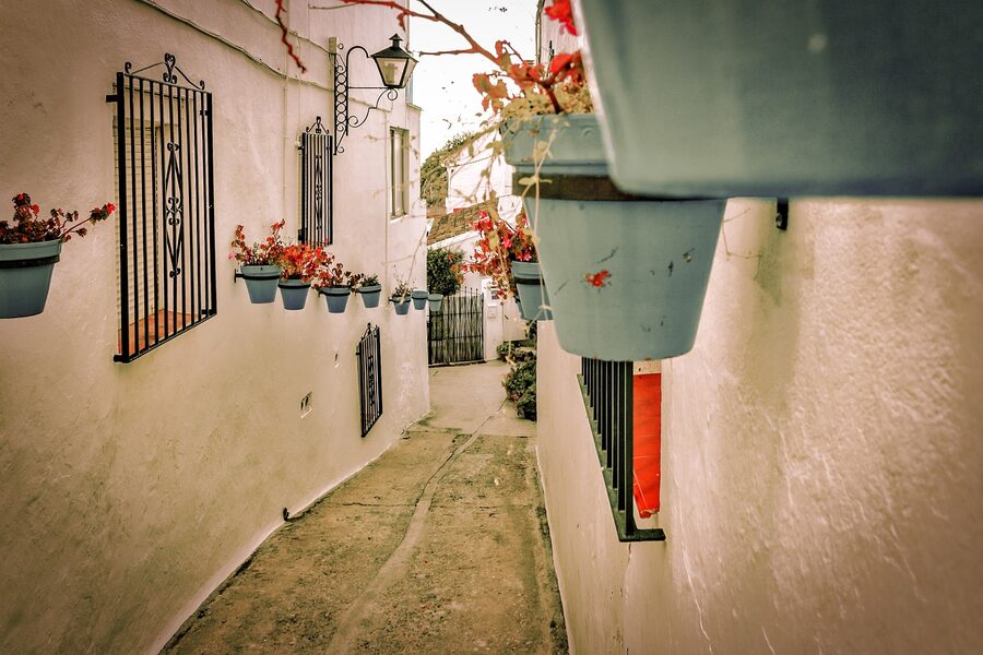 Whitewashed Mijas pueblo street with traditional Spanish architecture