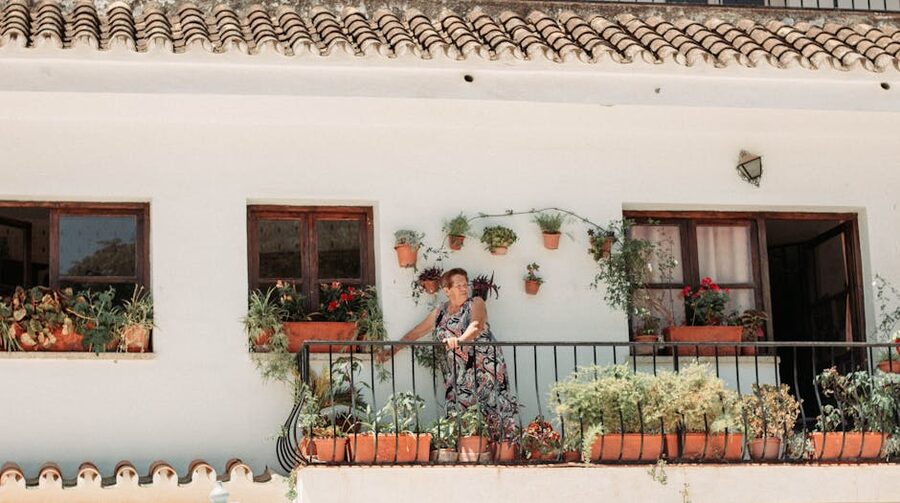 Mijas Spanish balcony with potted plants overlooking the village