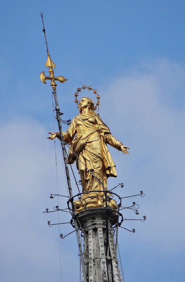 La Madonnina golden statue at the top of Milan Duomo
