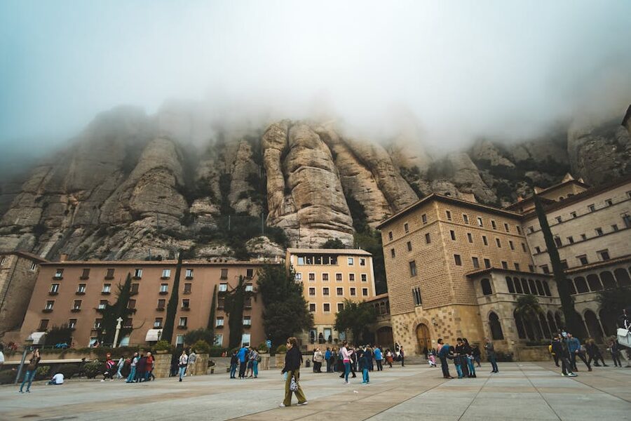 Monistrol de Montserrat monastery with fog in the valley