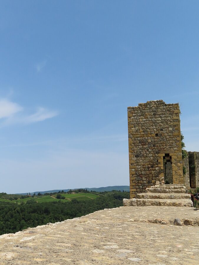 Walls and towers of Monteriggioni from surrounding fields