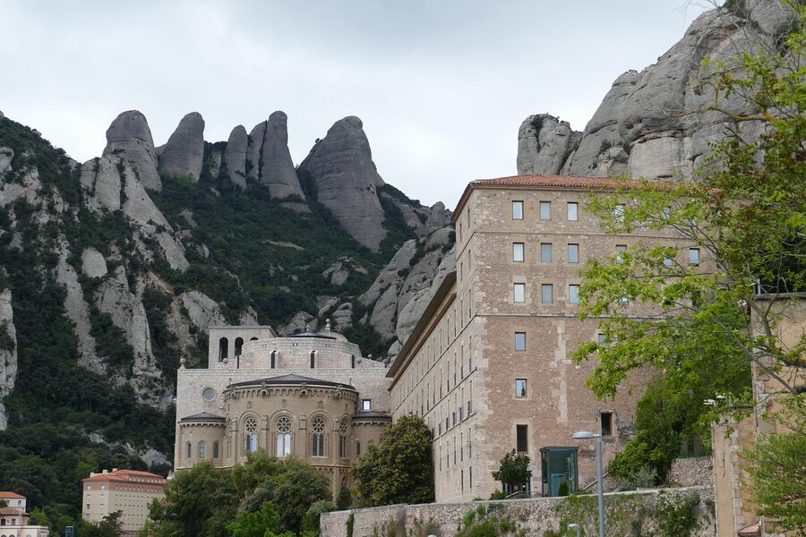 Pilgrims at the Montserrat monastery courtyard