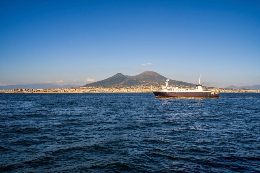 Ferry crossing the Bay of Naples with Mount Vesuvius in the background