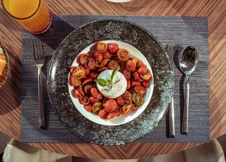 Caprese salad with fresh mozzarella tomatoes basil