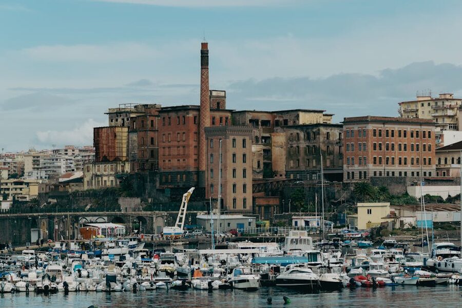 Naples historic port and seafront with Vesuvius