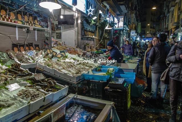 Mercato Pignasecca in Naples with vegetable stalls