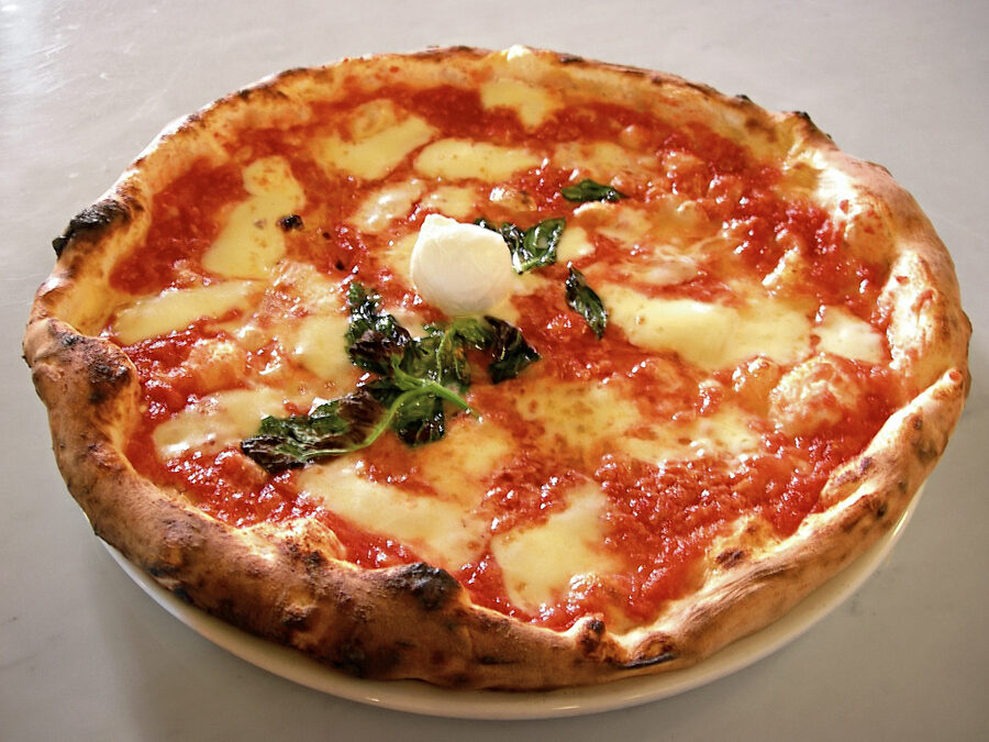 Classic Neapolitan Pizza Margherita with tomato mozzarella and basil