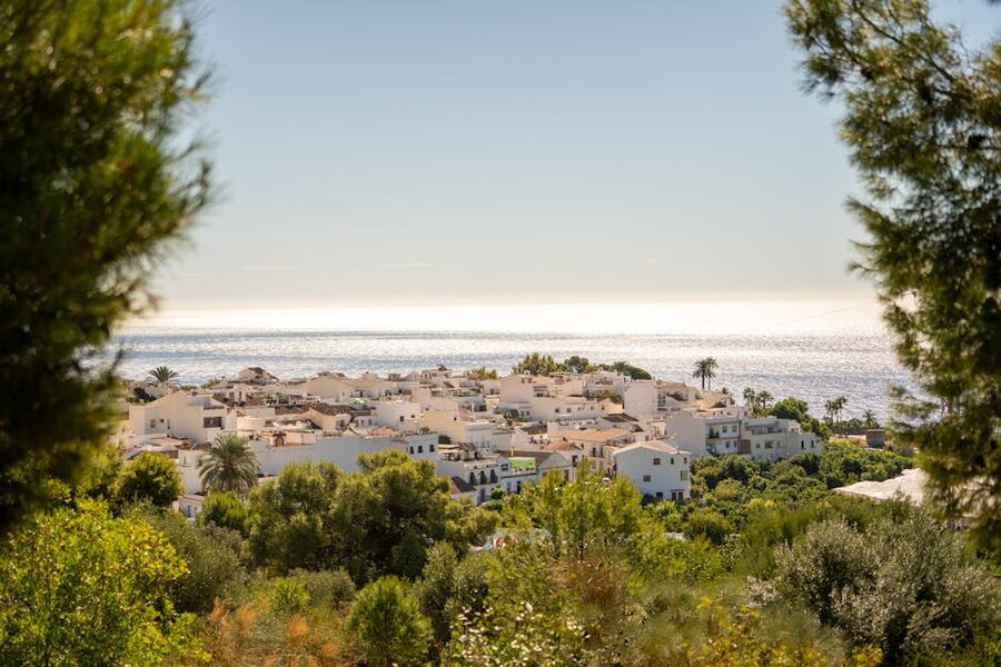 Coastal view of Nerja, Spain with the Mediterranean and whitewashed buildings