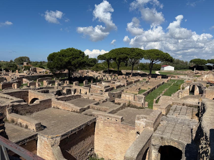 Ancient Roman architecture and brick walls at Ostia Antica under a clear sky