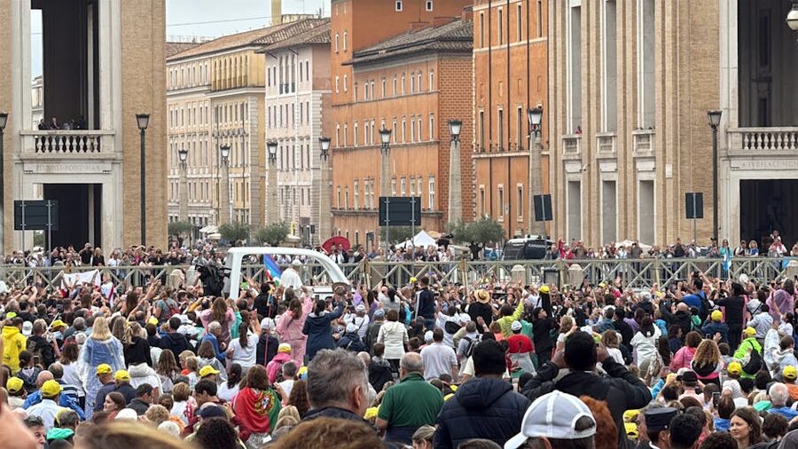 Popemobile procession through the crowd at Vatican City