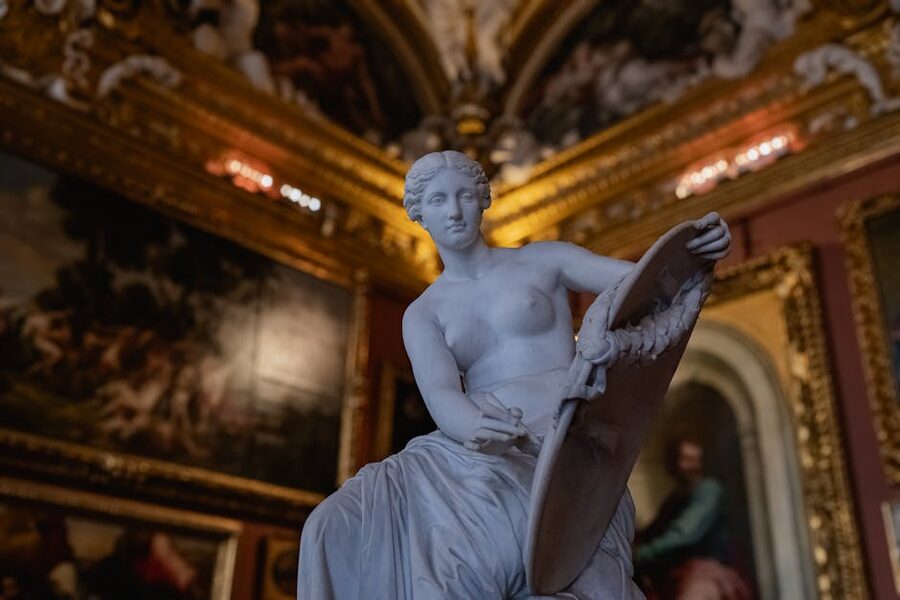 Pitti Palace marble statue with gilded frames
