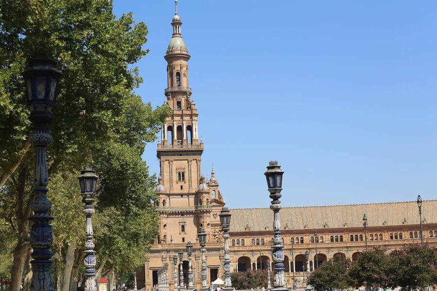 Plaza de España tower against blue sky Seville