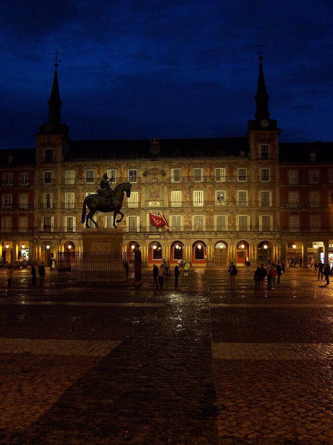 Plaza Mayor Madrid at dusk, gateway to the flamenco district