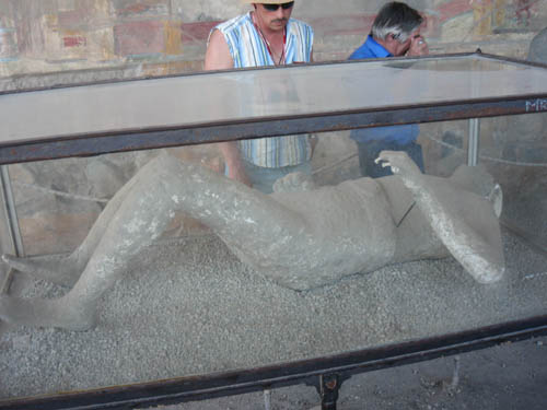 Plaster casts of victims displayed in the Macellum at Pompeii