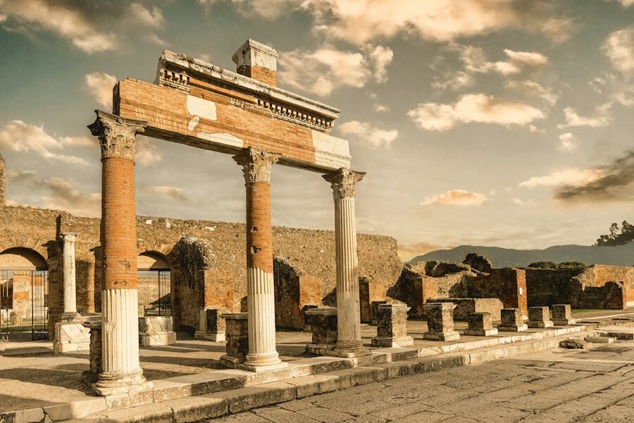 Pompeii ruins under a dramatic sky