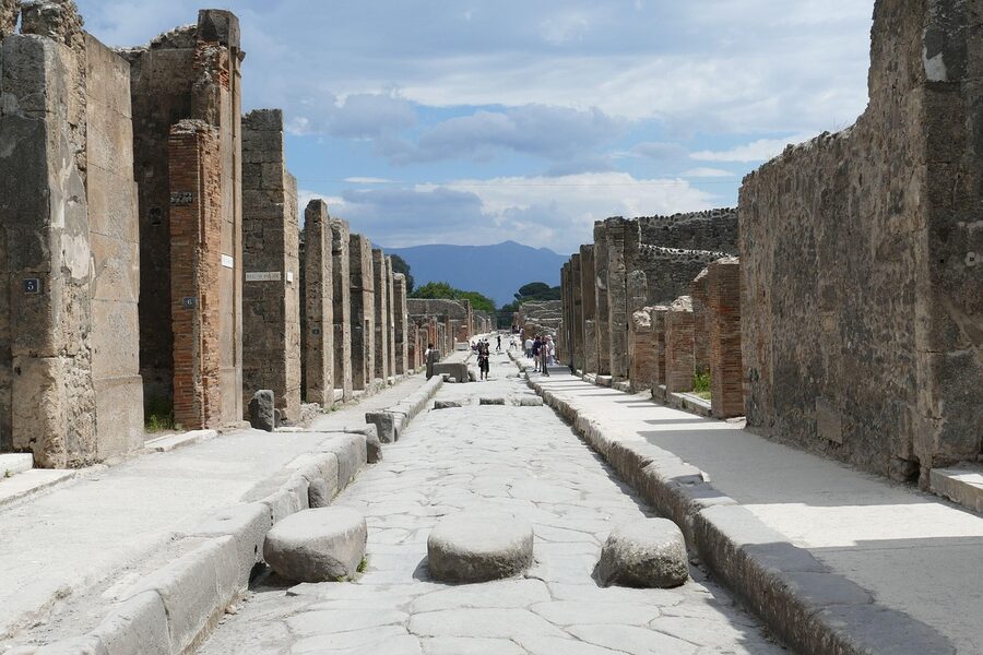 Pompeii ancient road with stepping stones and chariot ruts