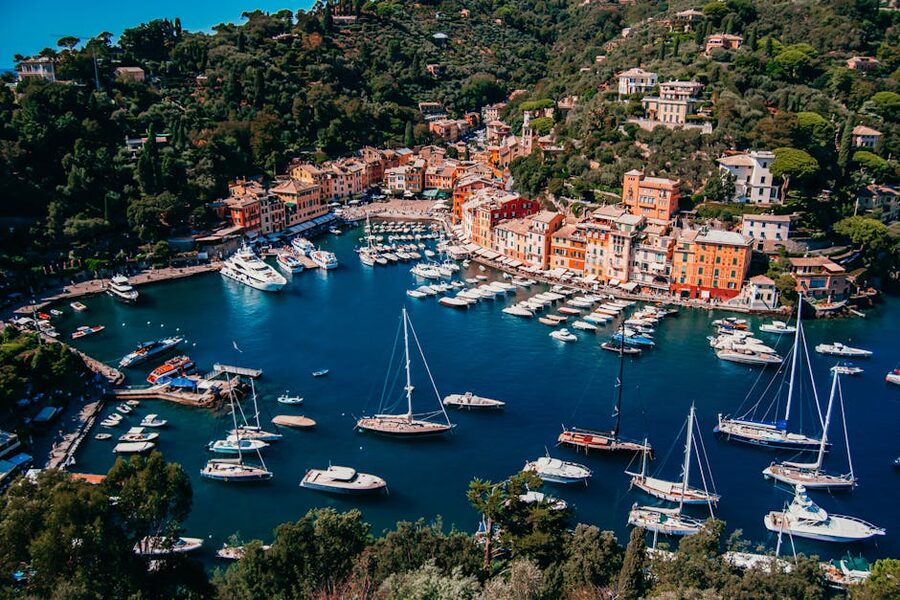 Aerial view of Portofino harbor with yachts and pastel buildings