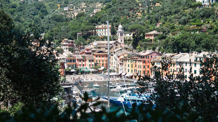 Portofino harbor in springtime with calm water and yachts