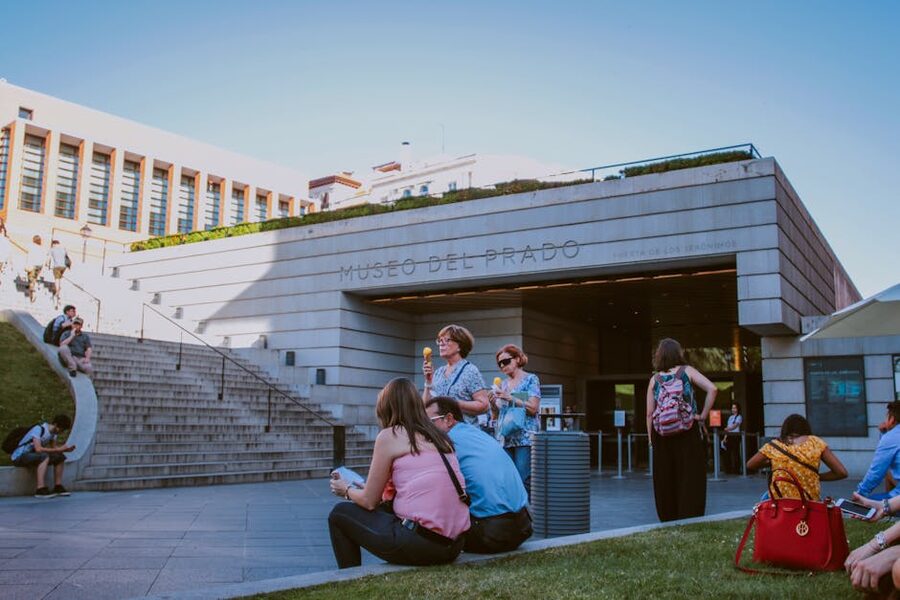 Visitors at the entrance of Museo del Prado on a sunny day