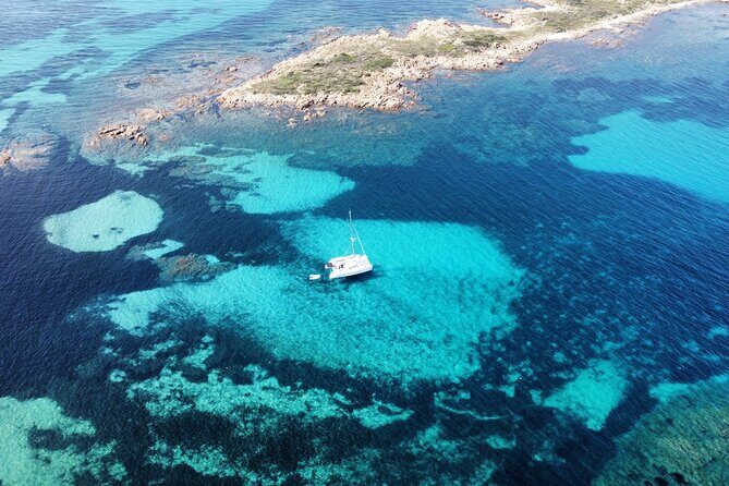 Private catamaran sailing trip around La Caletta -Berchida - Sardinia - The Sum Up