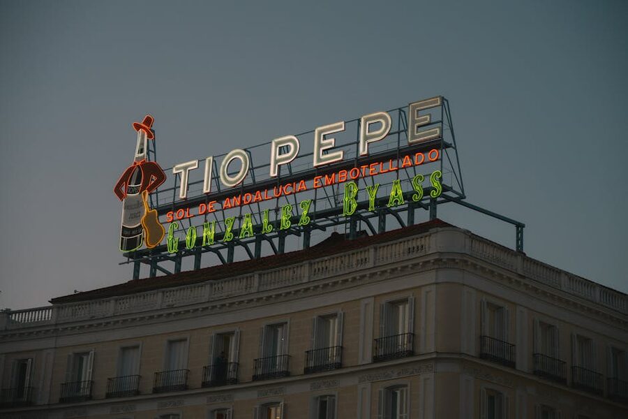 Tio Pepe sign at dusk in Puerta del Sol Madrid