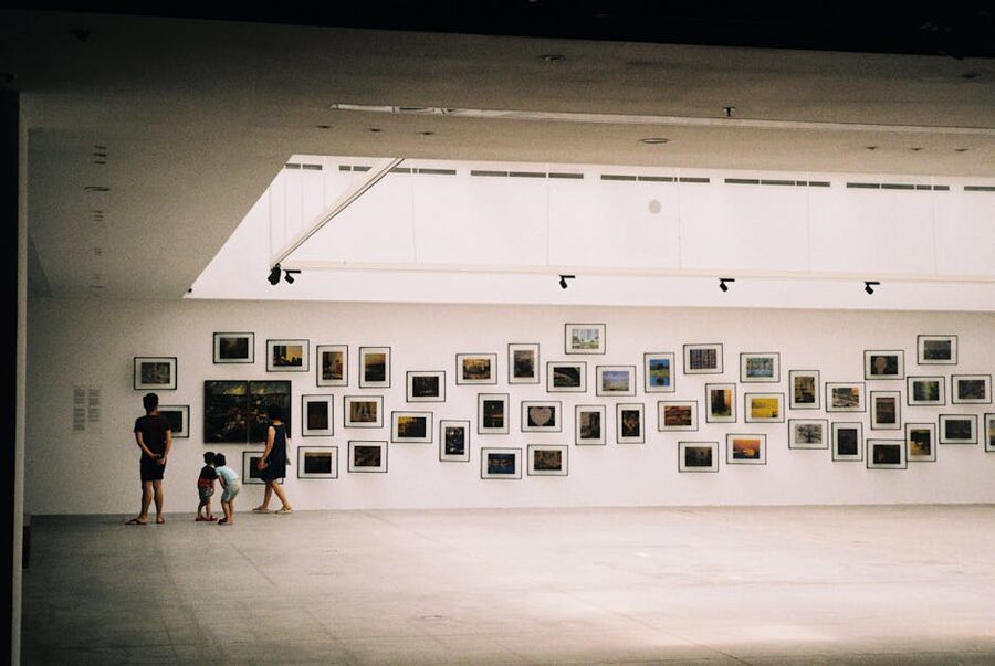 Family exploring a modern art exhibition
