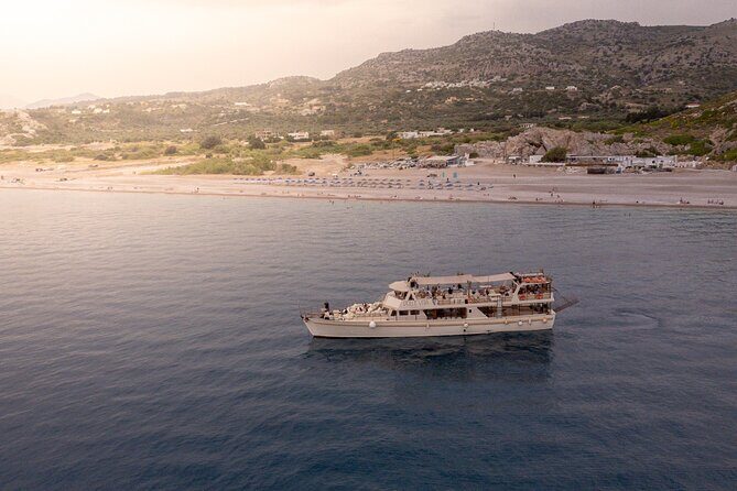 Rhodes: Beach Gem Exploration Cruise with Lunch & Transfer - What to Expect: Food, Drinks, and Atmosphere