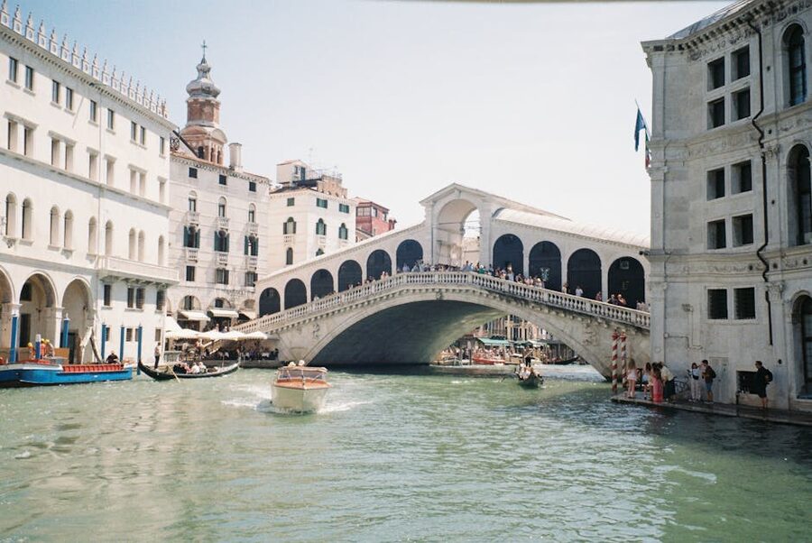 Rialto Bridge crowded with tourists in summer