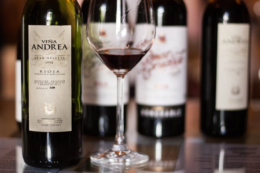 Rioja wine bottles and tasting glass