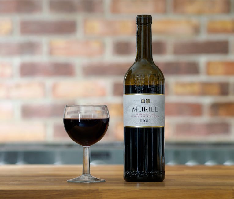 Rioja wine bottle and glass paired with pintxos