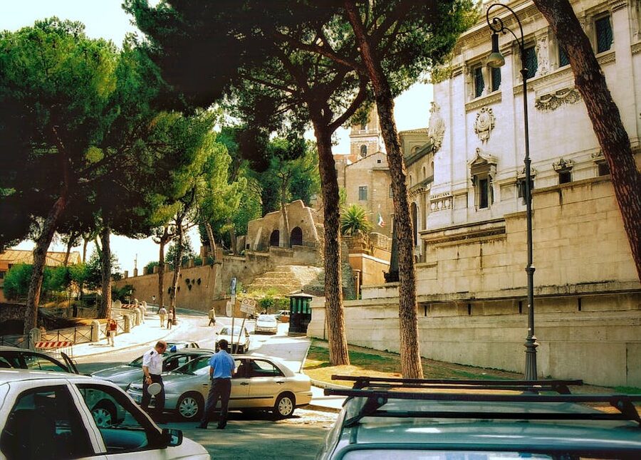 Busy street in Rome, Italy with historical buildings