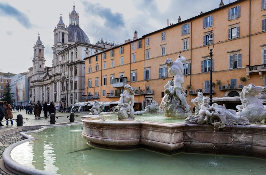 Piazza Navona Fountain of Neptune and Sant Agnese church Rome