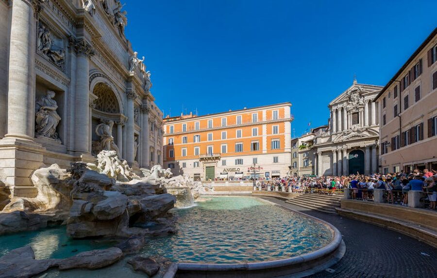 Trevi Fountain crowd in Rome on a sunny day