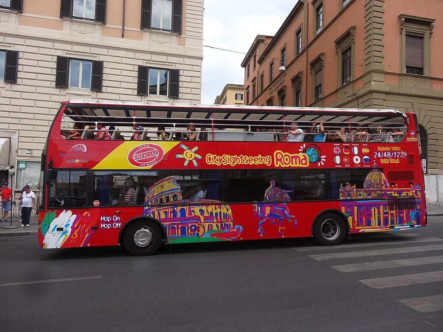 Hop-on hop-off bus on Via Liberiana near Santa Maria Maggiore Rome