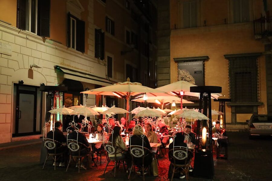 Outdoor dining in Rome at night after a tour